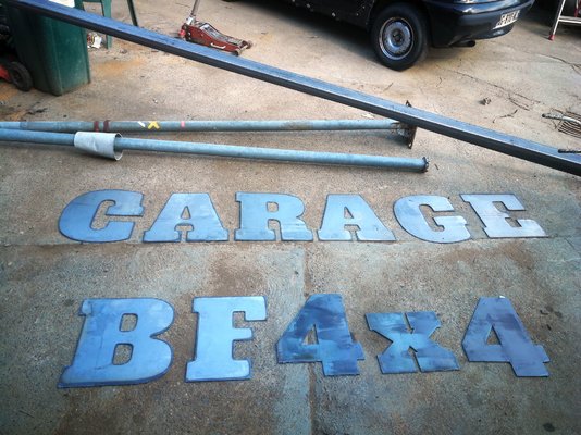 Garage sign | MIG Welding Forum